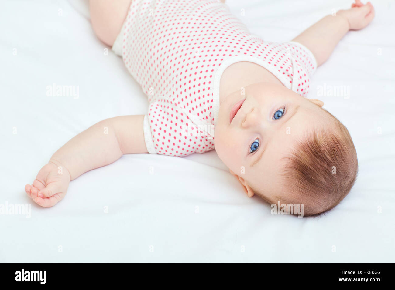 Beautiful baby with clear eyes did not lie back. View from above Stock ...