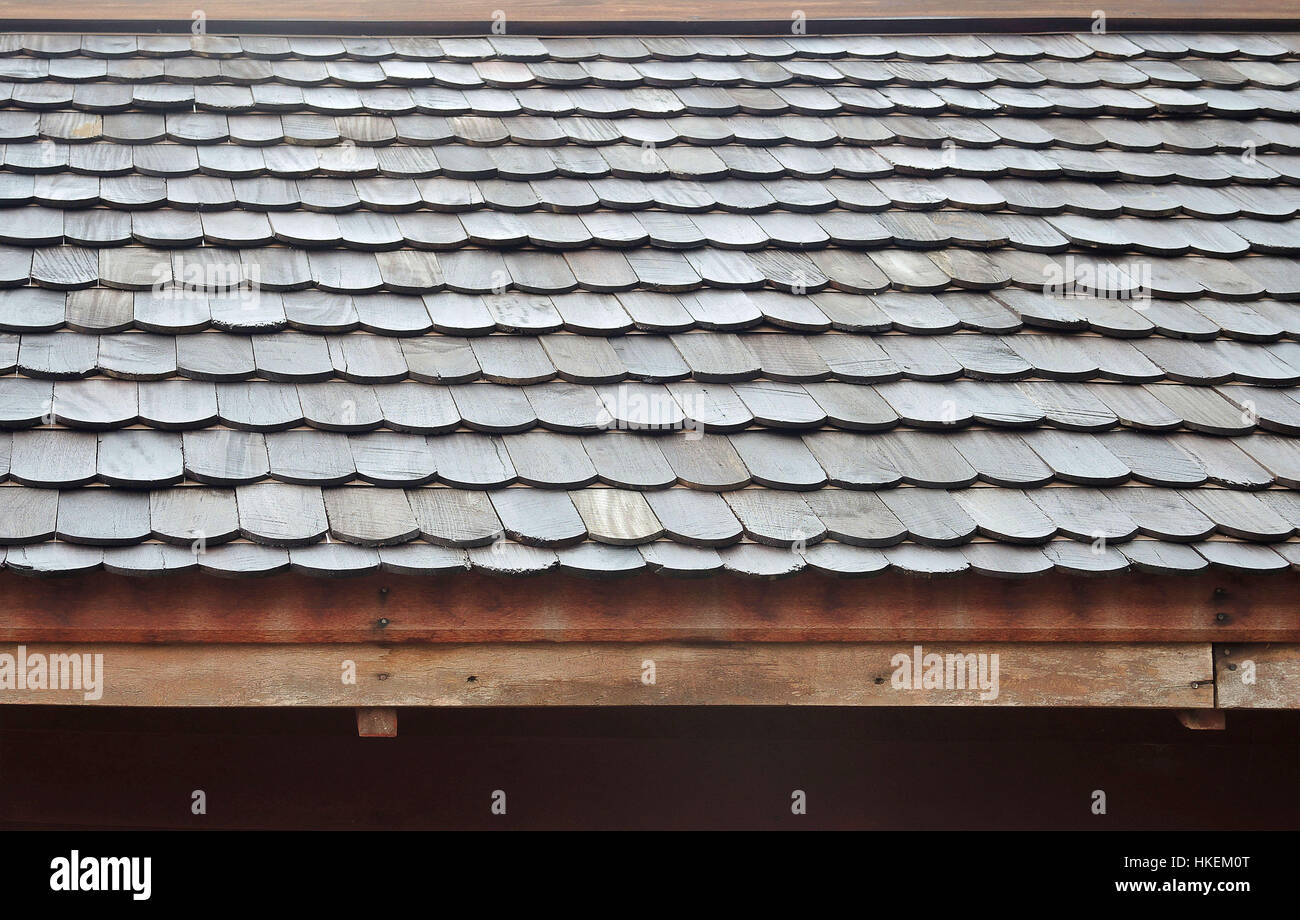 Wood shingles roof. Hand made roof made from teak wood Stock Photo - Alamy