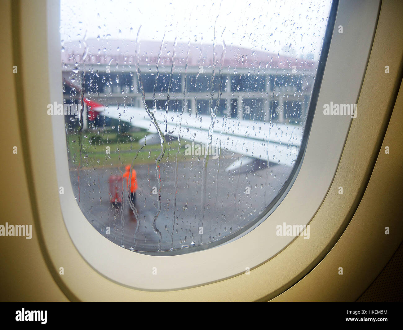 Drops of rain on the airplane window Stock Photo - Alamy