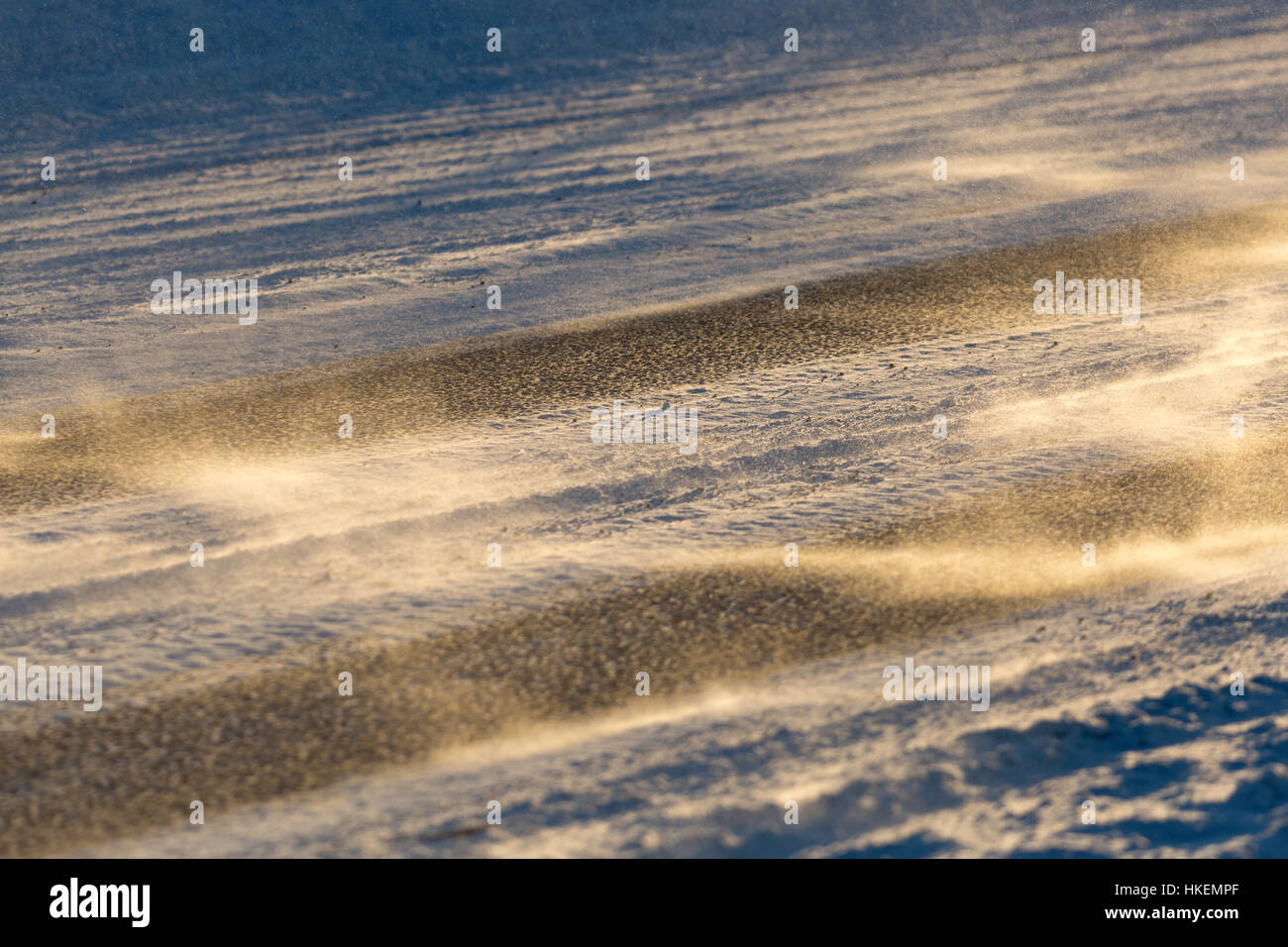 Snow Smoke on Winter Road Stock Photo - Alamy