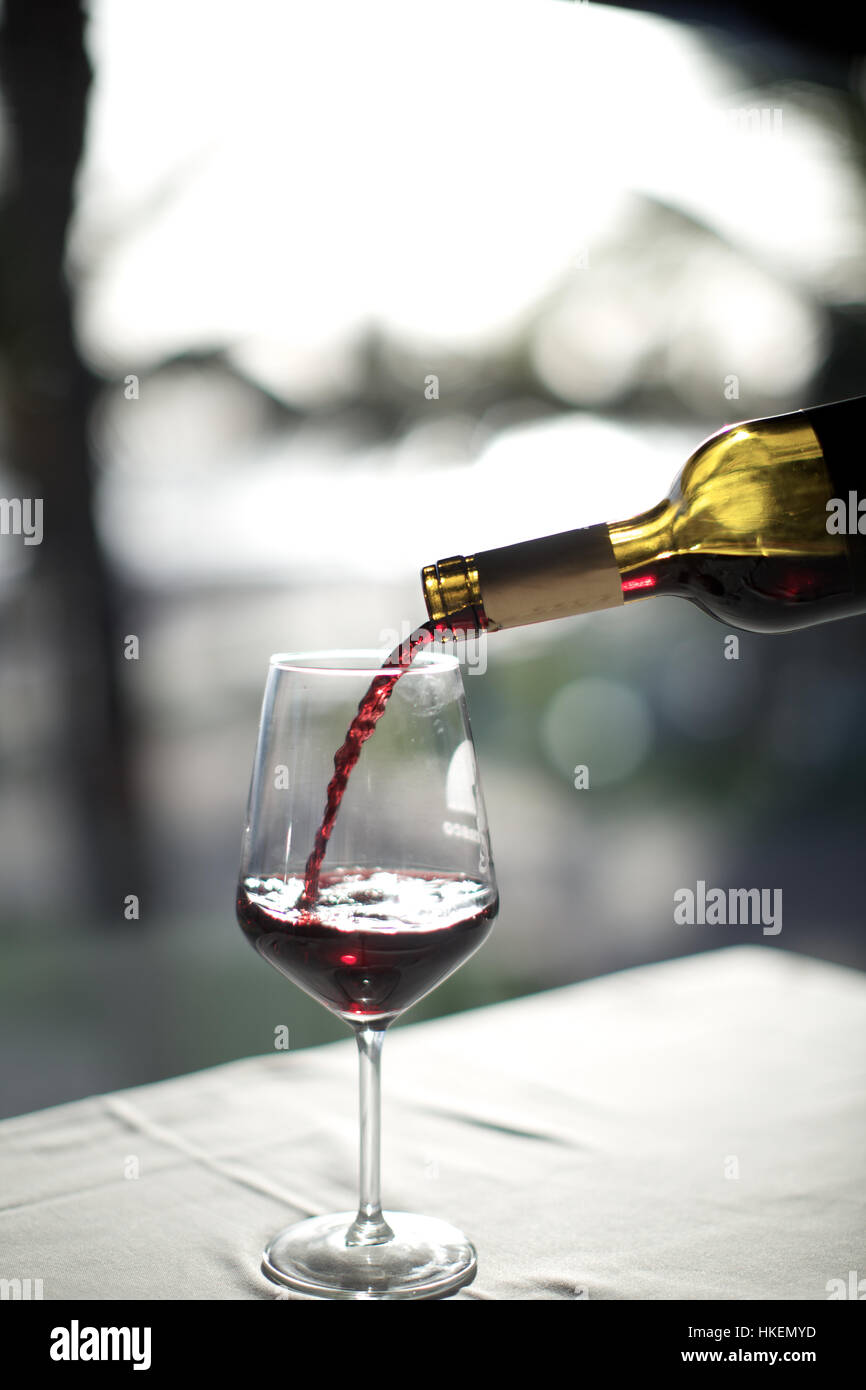 Wine poured bottle hi-res stock photography and images - Alamy