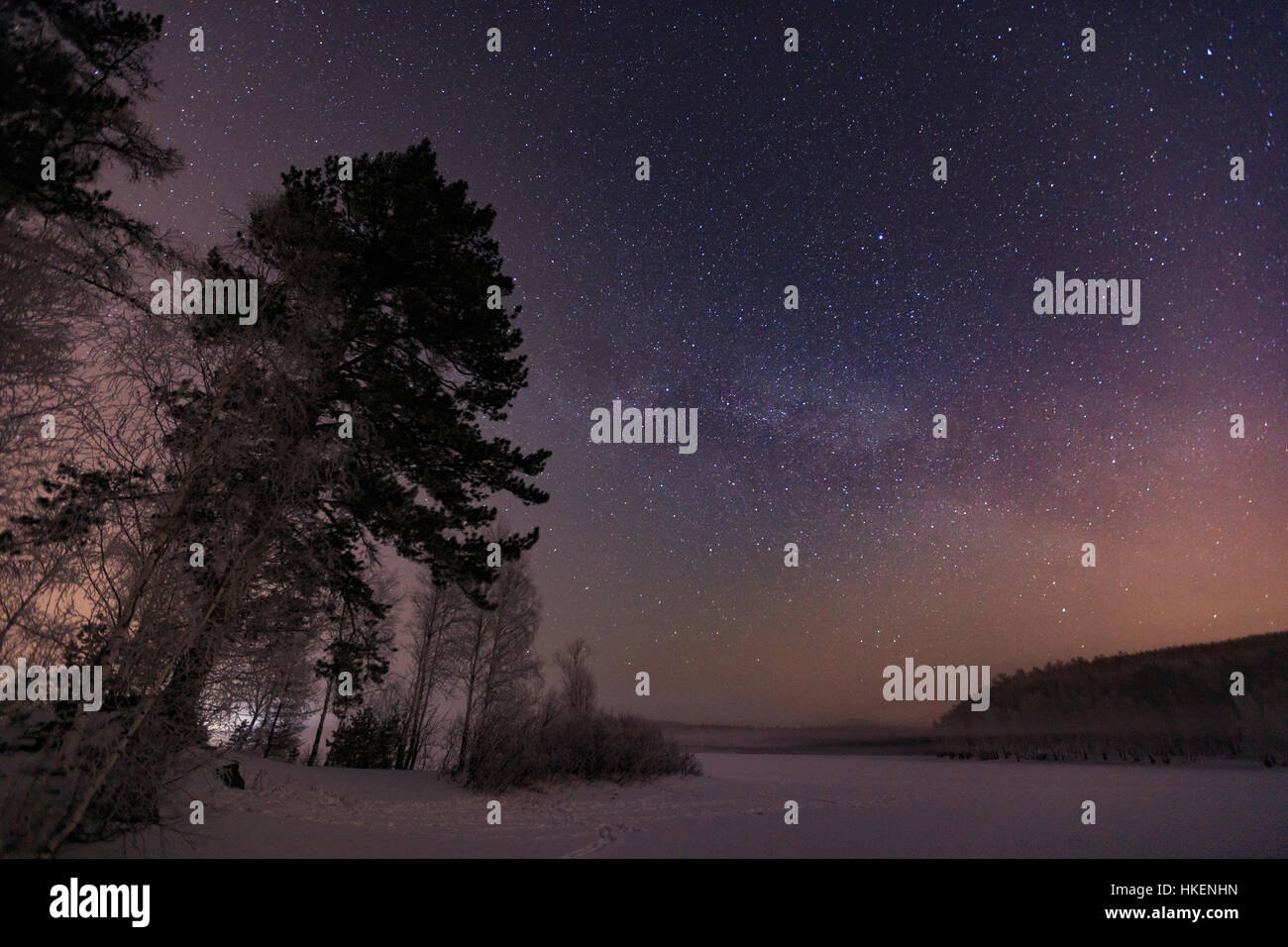 night sky in forest, frozen lake with night stars sky, russian winter ...