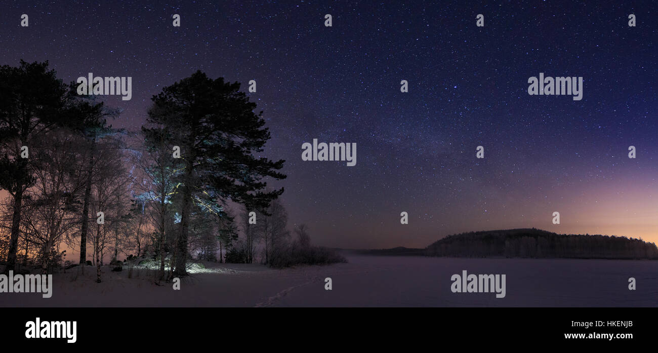 night sky in forest, frozen lake with night stars sky, russian winter ...