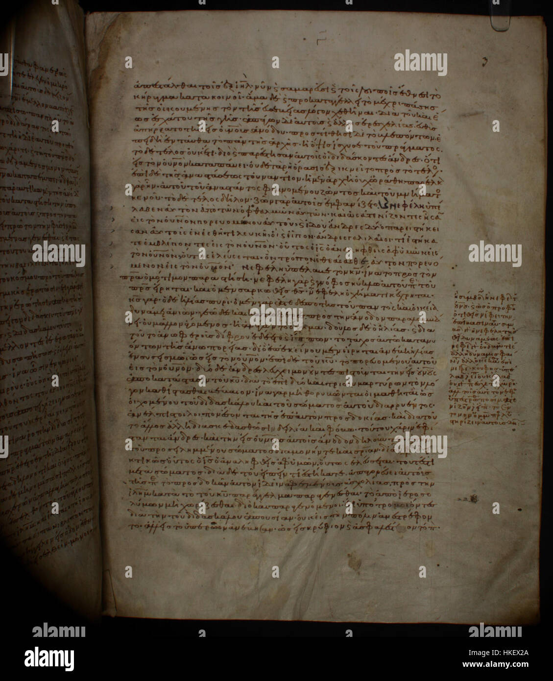 This image showcases a page from *Uncial 0142*, a medieval manuscript ...