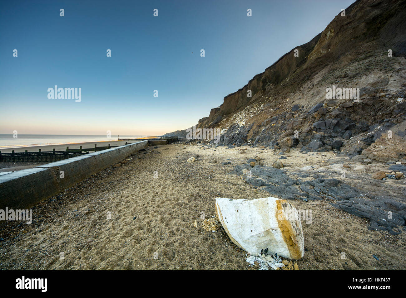 Sheringham cliffs rock fall coastal erosion Stock Photo - Alamy