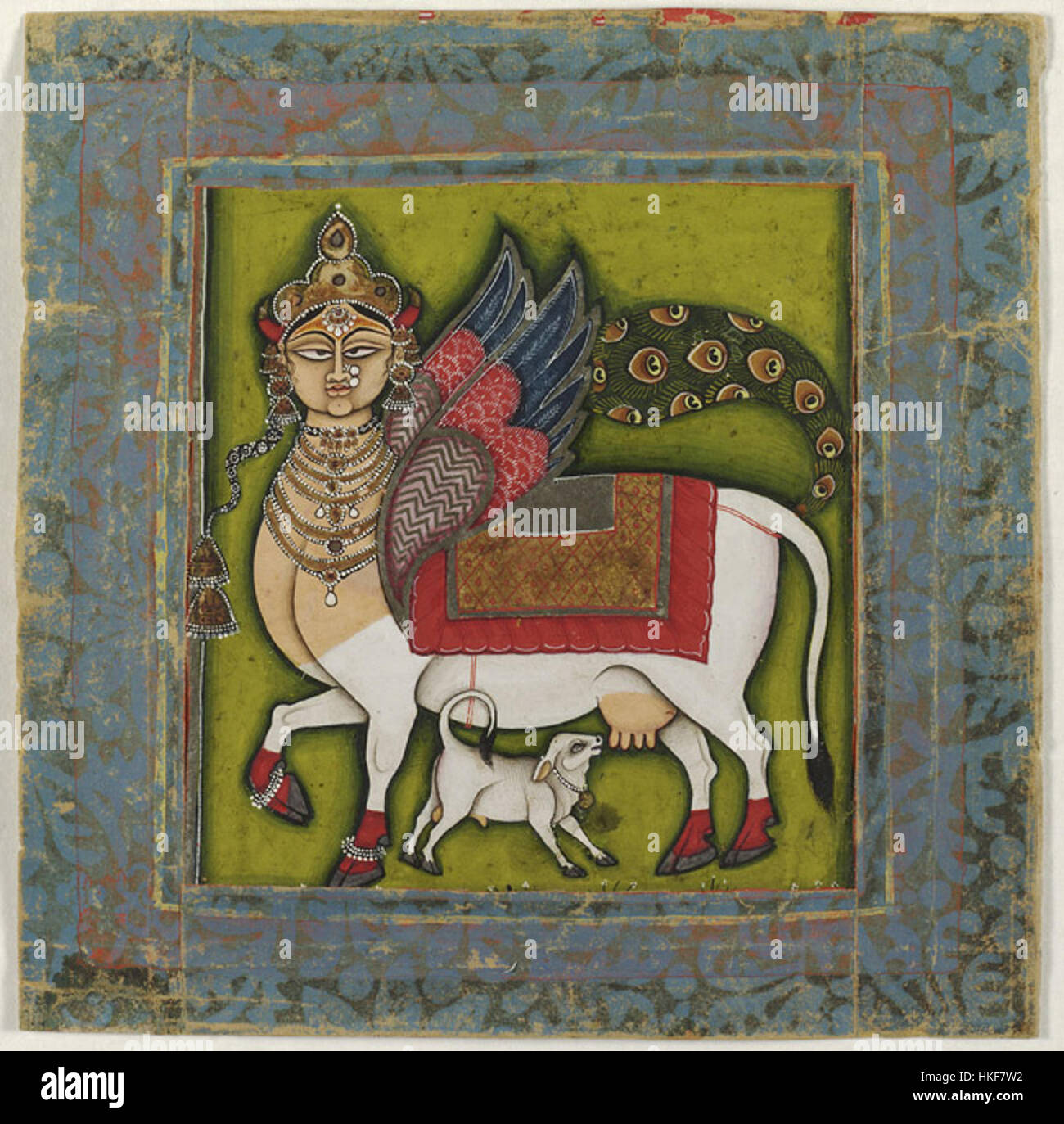 Kamadhenu, the mythical wish-granting cow, is depicted in this artwork ...