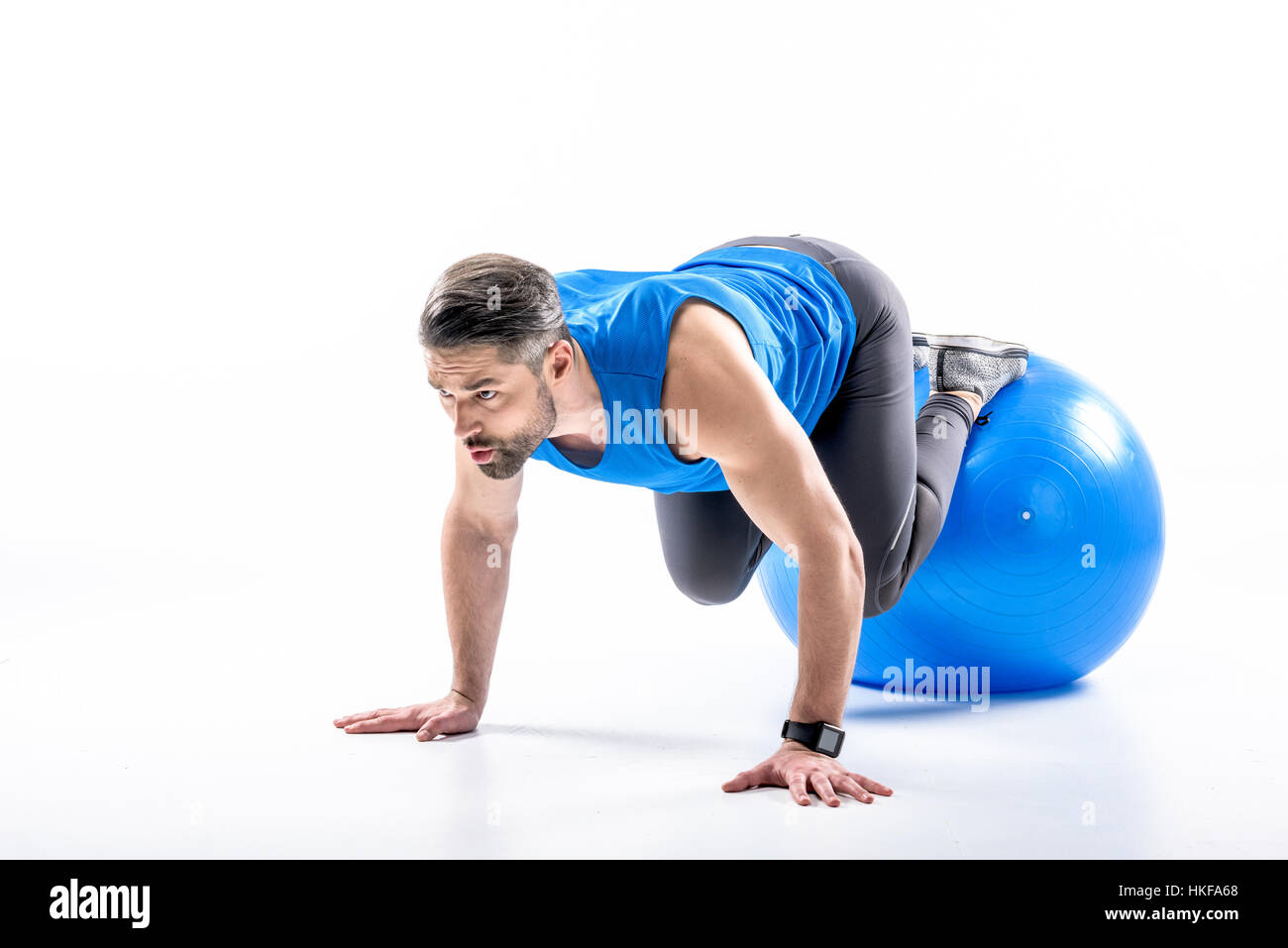 Man exercising on fit ball Stock Photo - Alamy