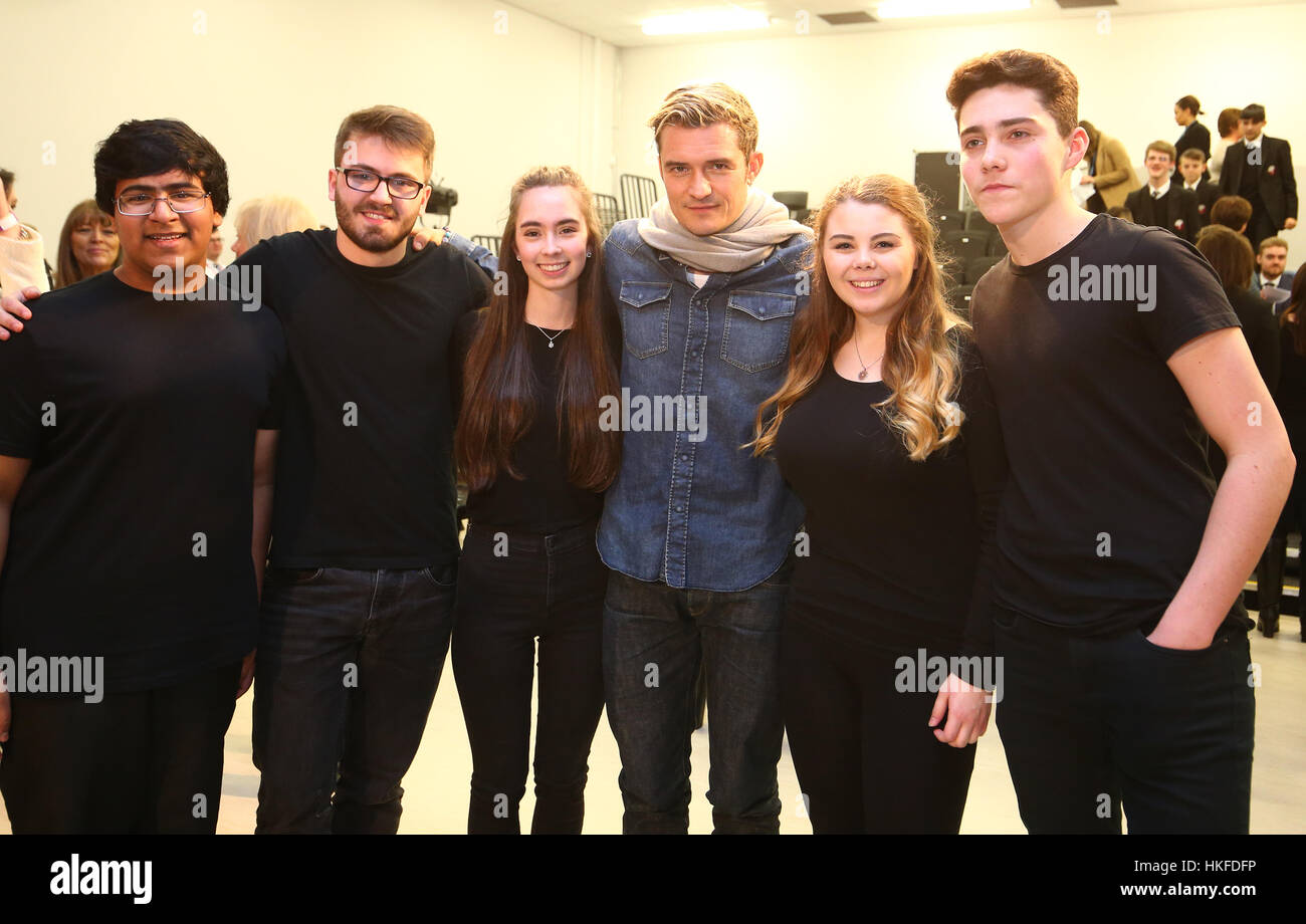 Actor Orlando Bloom (centre) meets pupils whilst attending the Laurus ...