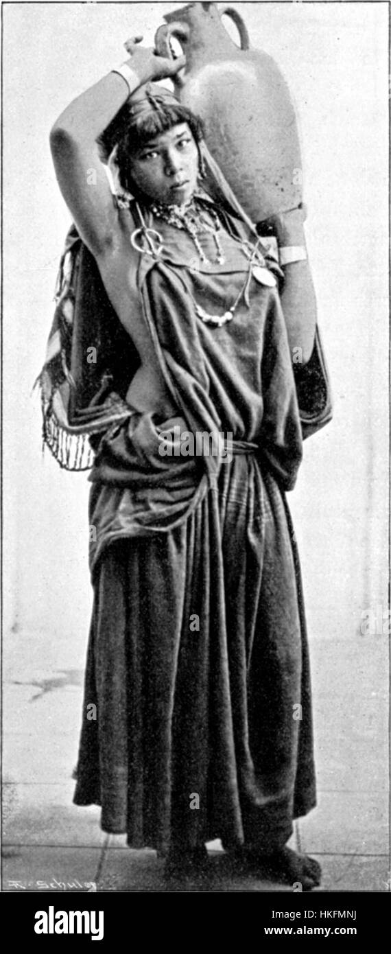 This illustration depicts a Kabyle woman from North Africa carrying ...