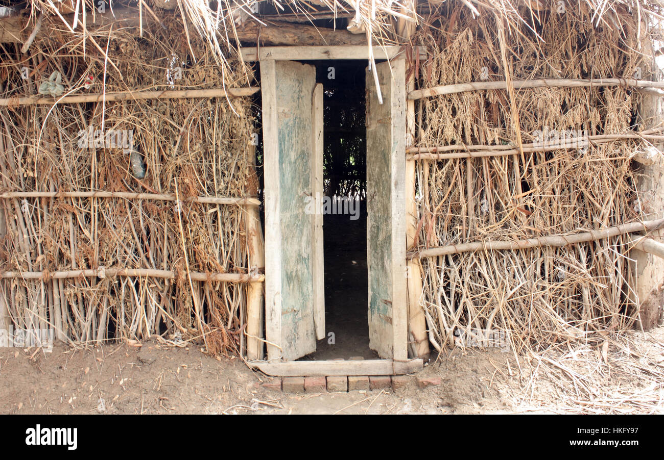 Open door of the House in small village Stock Photo - Alamy