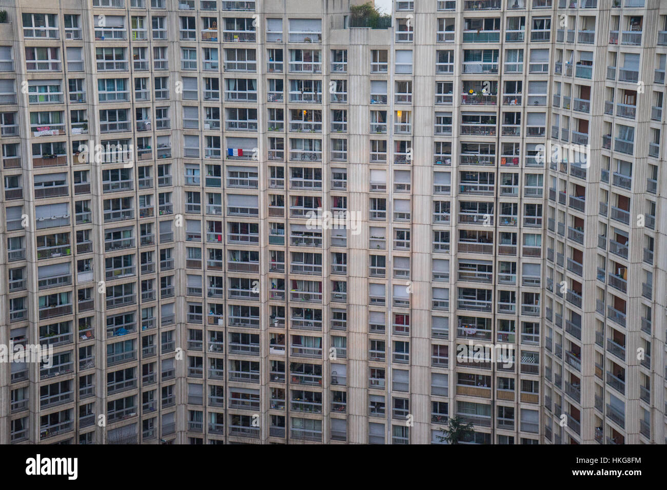 zoom in on a building facade. lots of windows aligned giving a ...