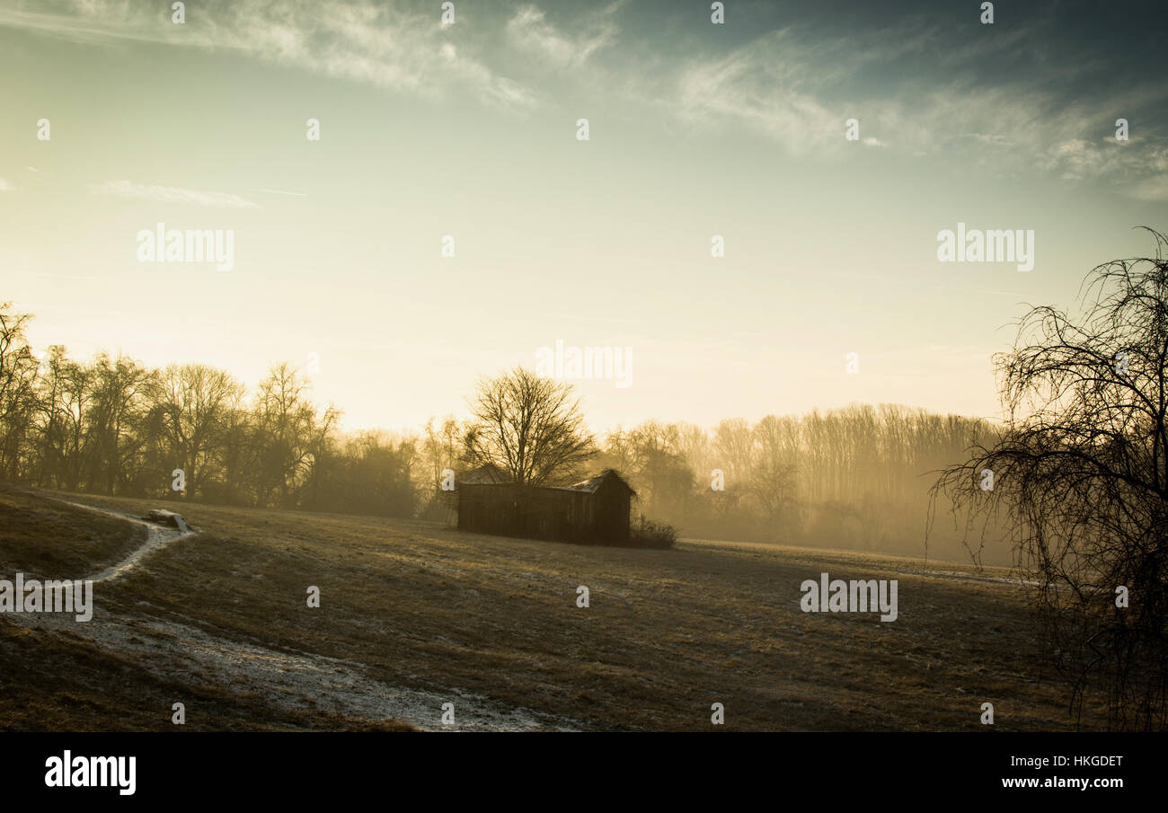 Barn in the mist Stock Photo - Alamy