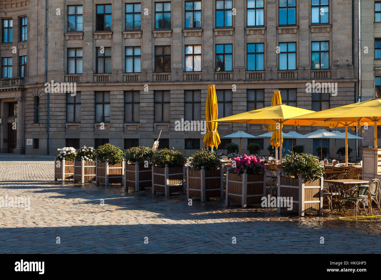 Street cafe on the square of old town (Riga, Latvia Stock Photo - Alamy