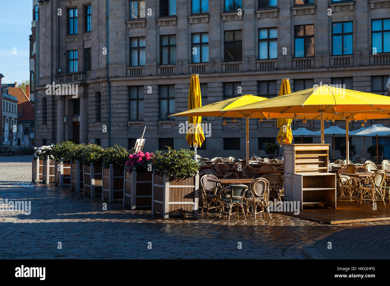 Street cafe on the square of old town (Riga, Latvia Stock Photo - Alamy