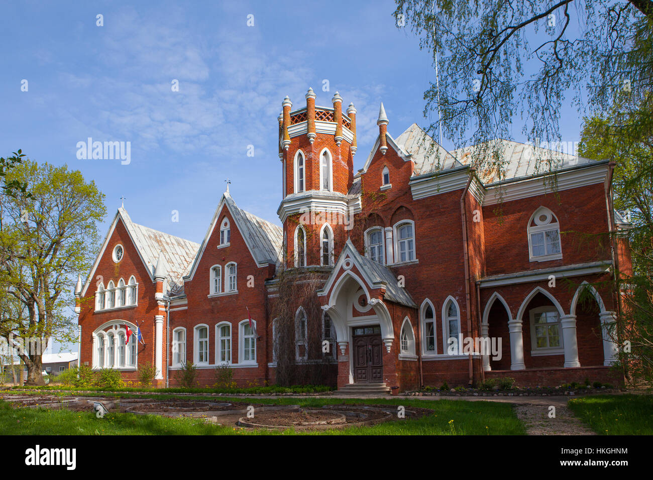 Old red brick castle at sunny day. Latvia Stock Photo - Alamy