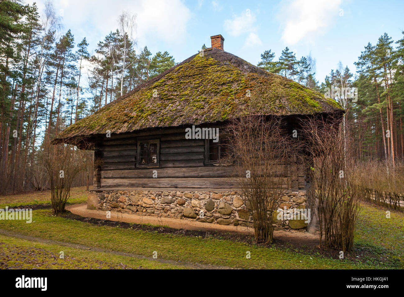 View of the rustic farm dwelling - stoned and wooden. Wooden ...