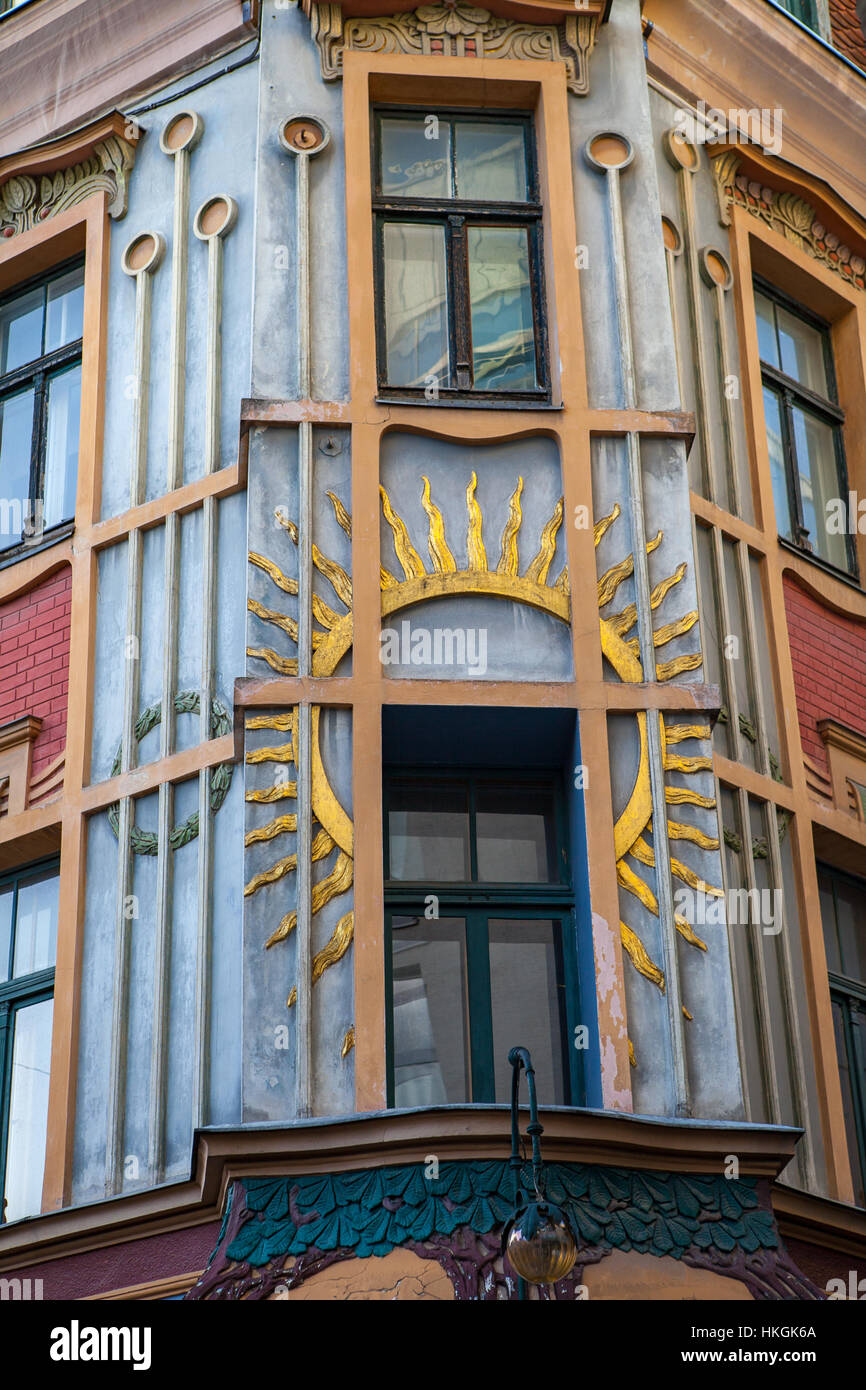 Early modern architecture of old Riga, Latvia. Golden sun painted over ...