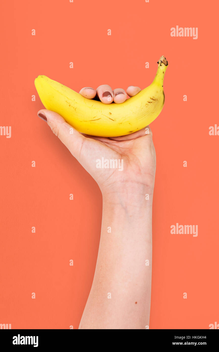 Hand banana hi-res stock photography and images - Alamy