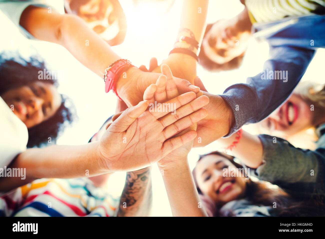 College students teamwork stacking hand hi-res stock photography and ...
