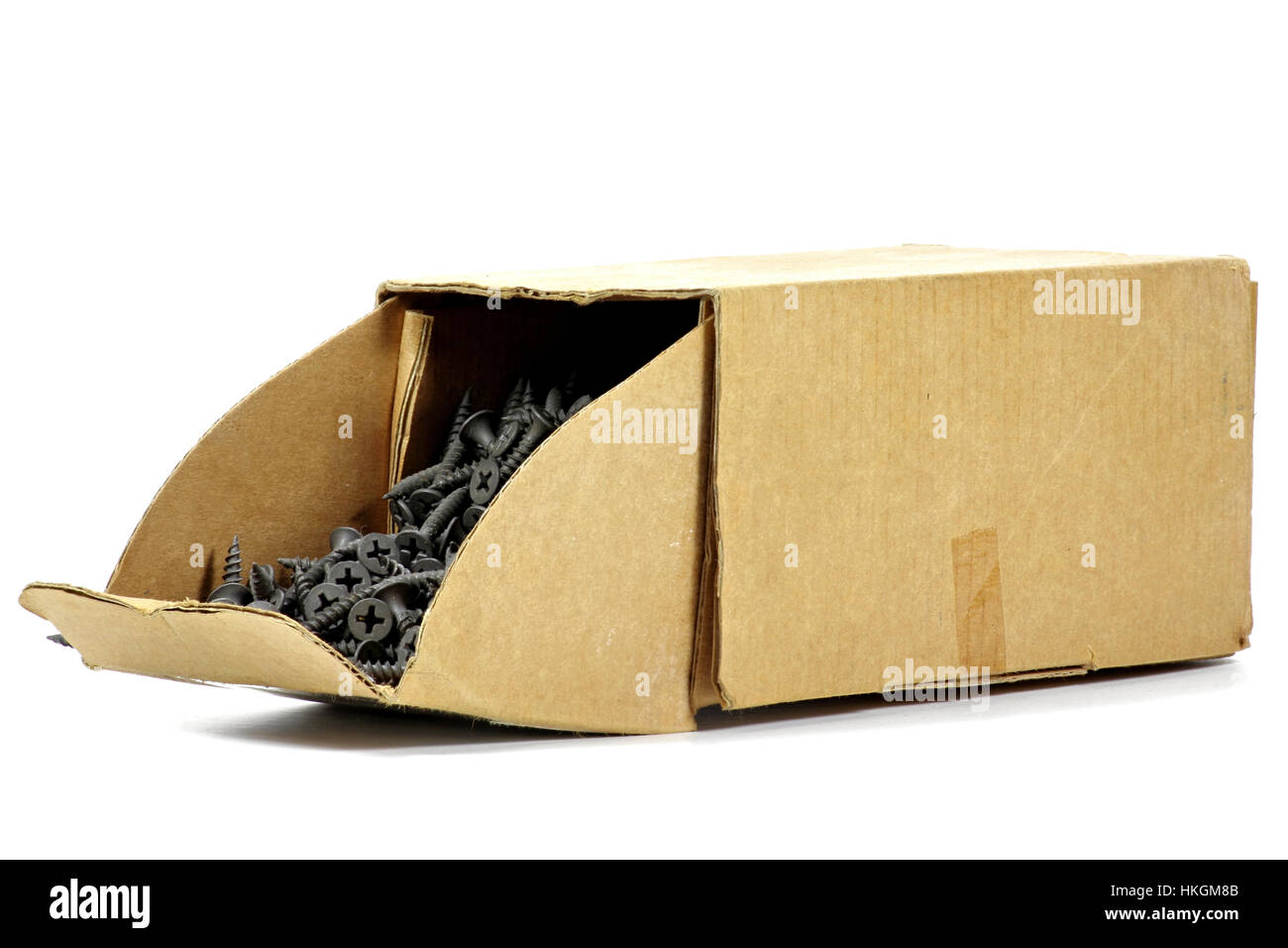 phosphated drywall screws in a cardboard container isolated on white ...