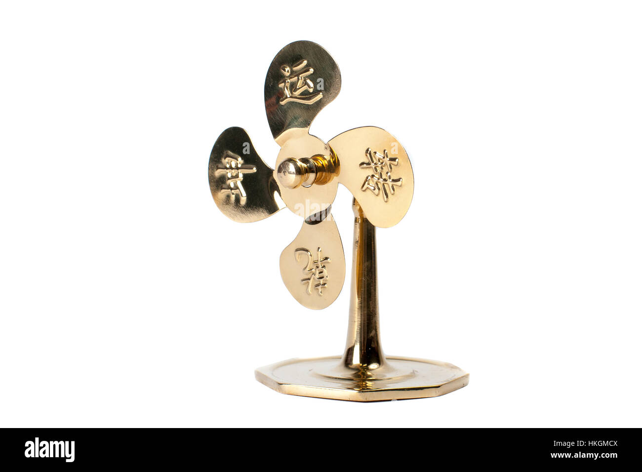 Golden fan isolated on white background Stock Photo - Alamy