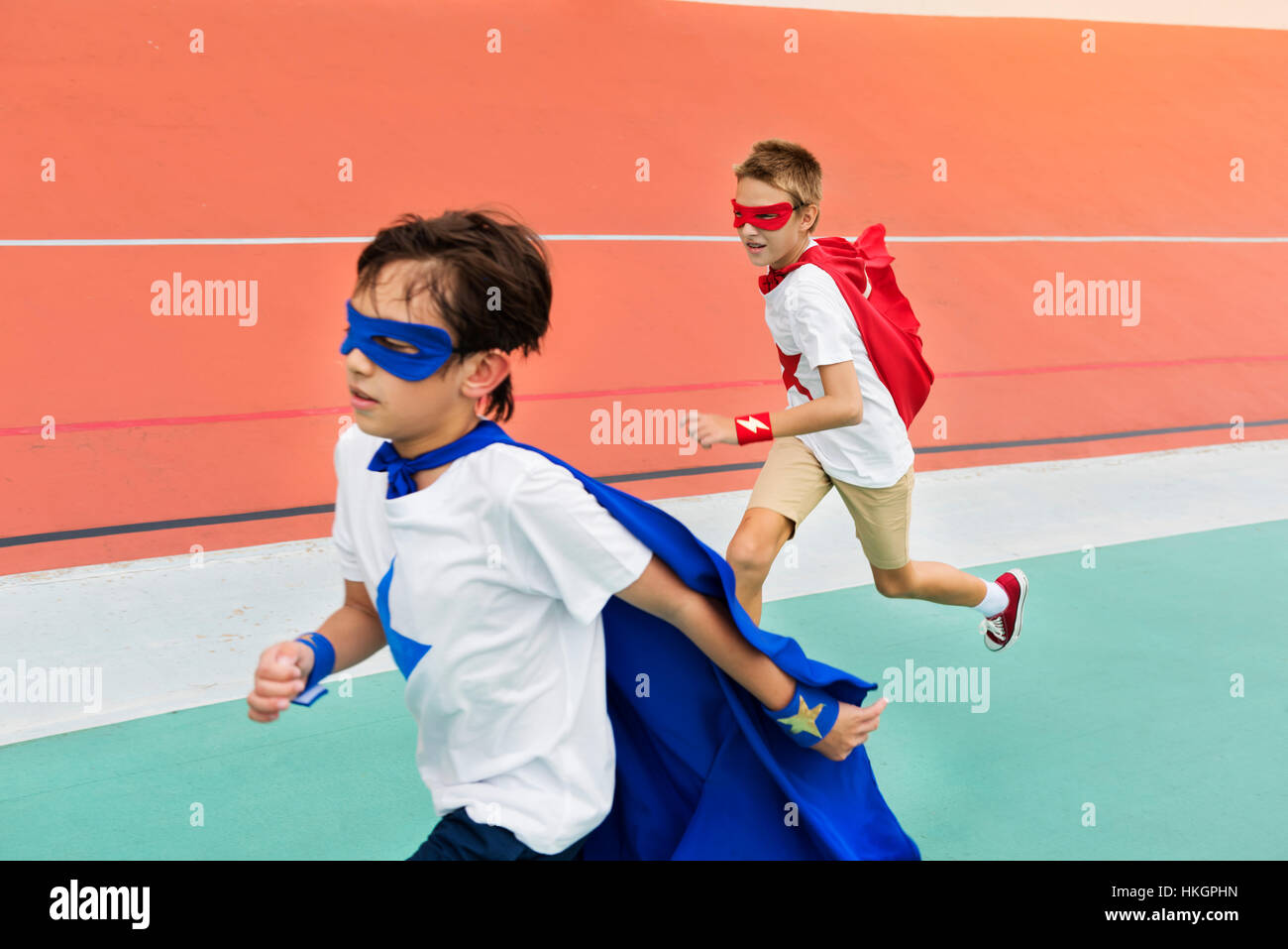 Superheroes Boys Running Competition Exercise Concept Stock Photo - Alamy