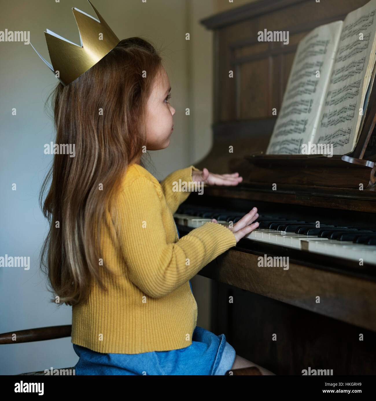 Adorable Cute Girl Playing Piano Concept Stock Photo - Alamy