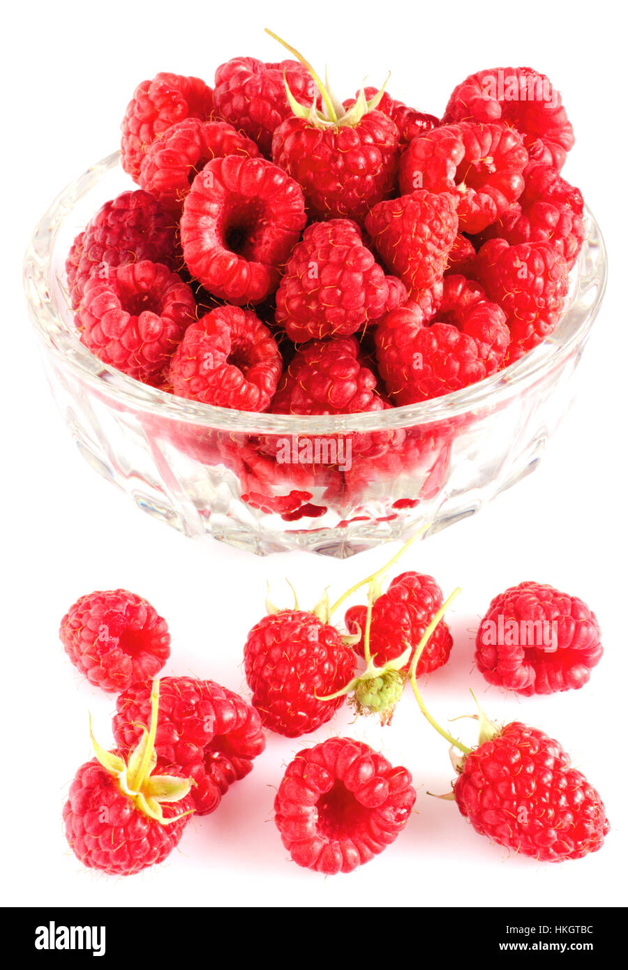 Raspberries in bowl isolated on white background Stock Photo - Alamy