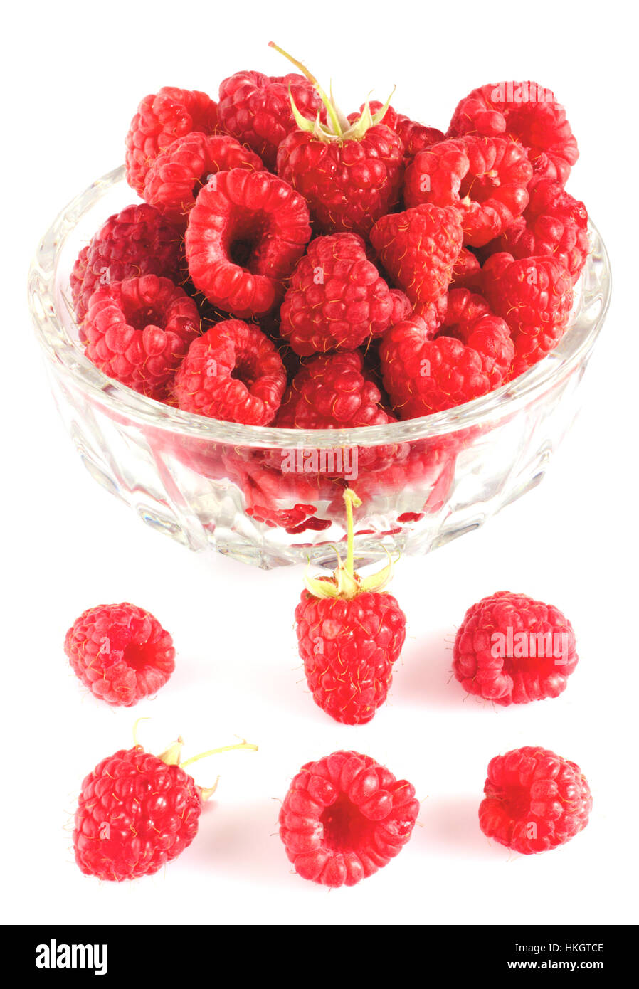 Raspberries in bowl isolated on white background Stock Photo - Alamy