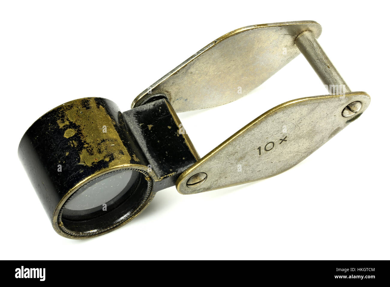 vintage folding magnifier with 10x magnification isolated on white ...