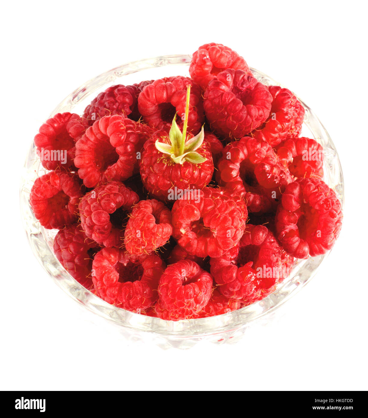 Raspberries in bowl isolated on white background Stock Photo - Alamy