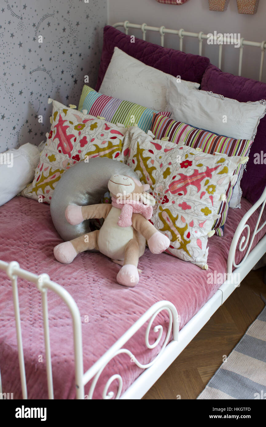 Soft toy on childrens bed cushion hi-res stock photography and images ...