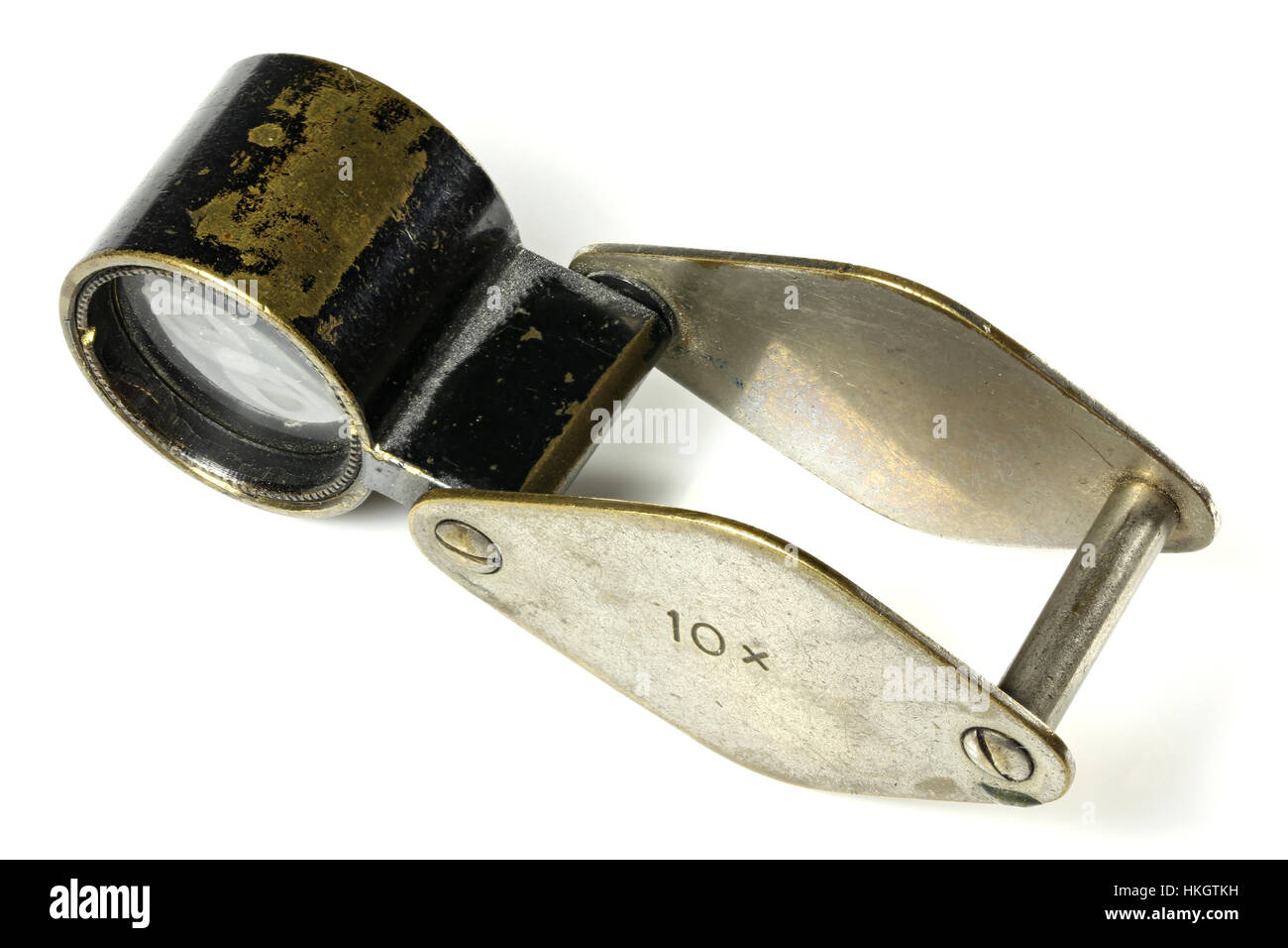 vintage folding magnifier with 10x magnification isolated on white ...