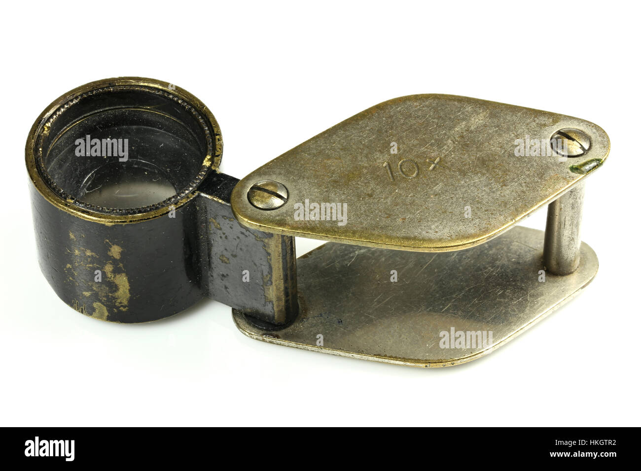 vintage folding magnifier with 10x magnification isolated on white ...