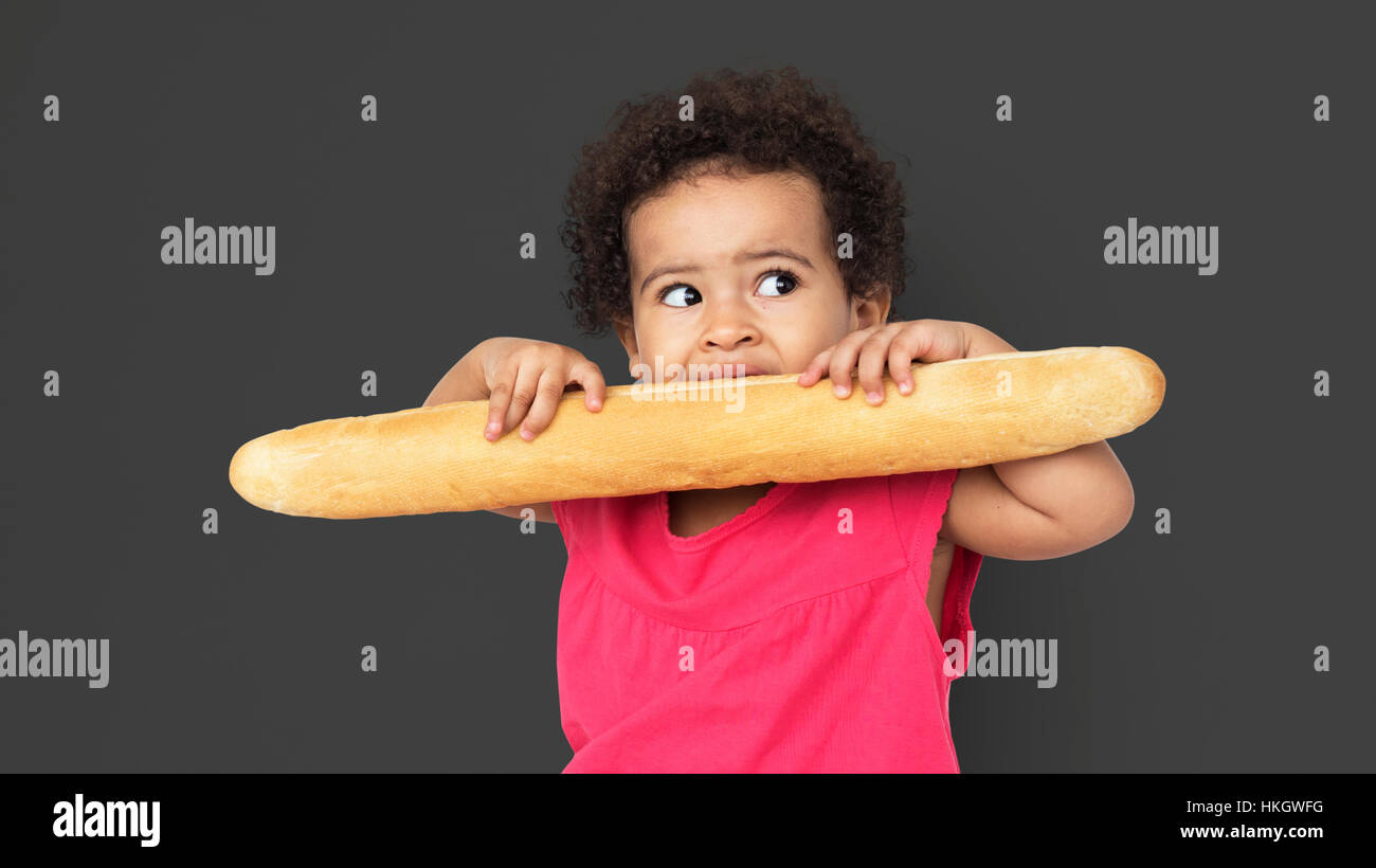 Little Kid With Bread Concept Stock Photo - Alamy