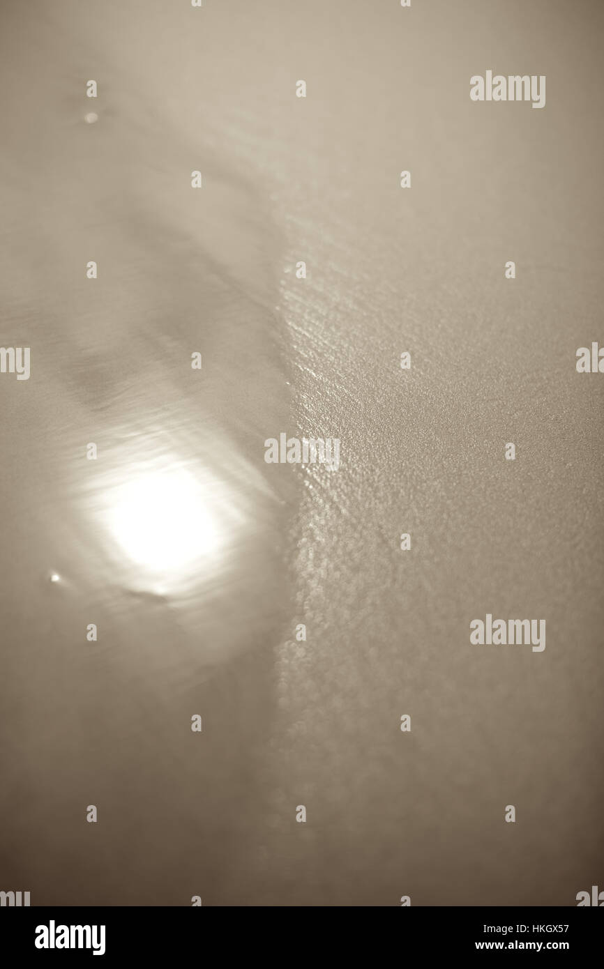 Wet sand on beach sand hi-res stock photography and images - Alamy