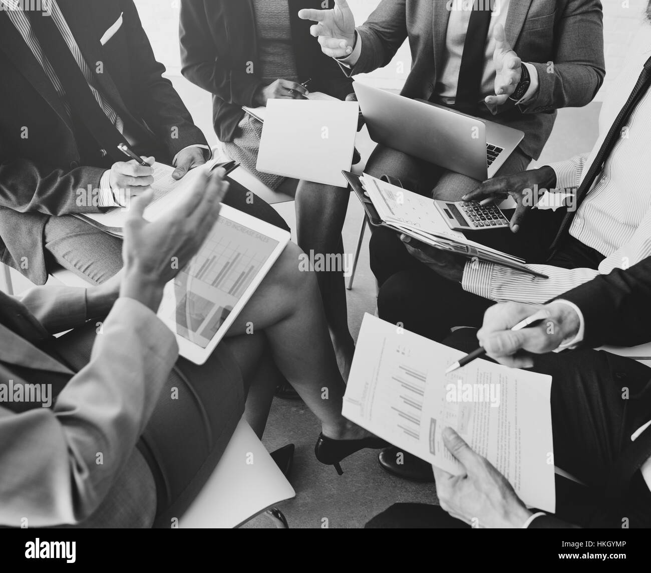 Meeting brainstorming cooperation discussion Black and White Stock ...