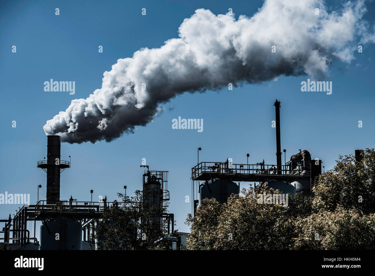 Industrial smoke stacks Stock Photo - Alamy