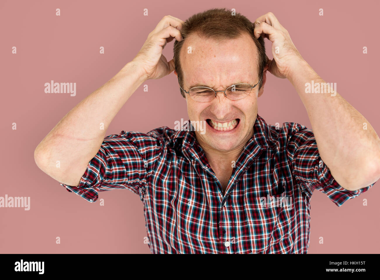 Old man scratching head hi-res stock photography and images - Alamy
