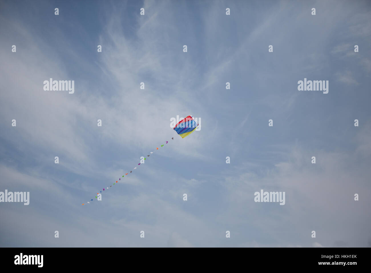 kite flying in sky. streamer, nature, string, pattern Stock Photo - Alamy