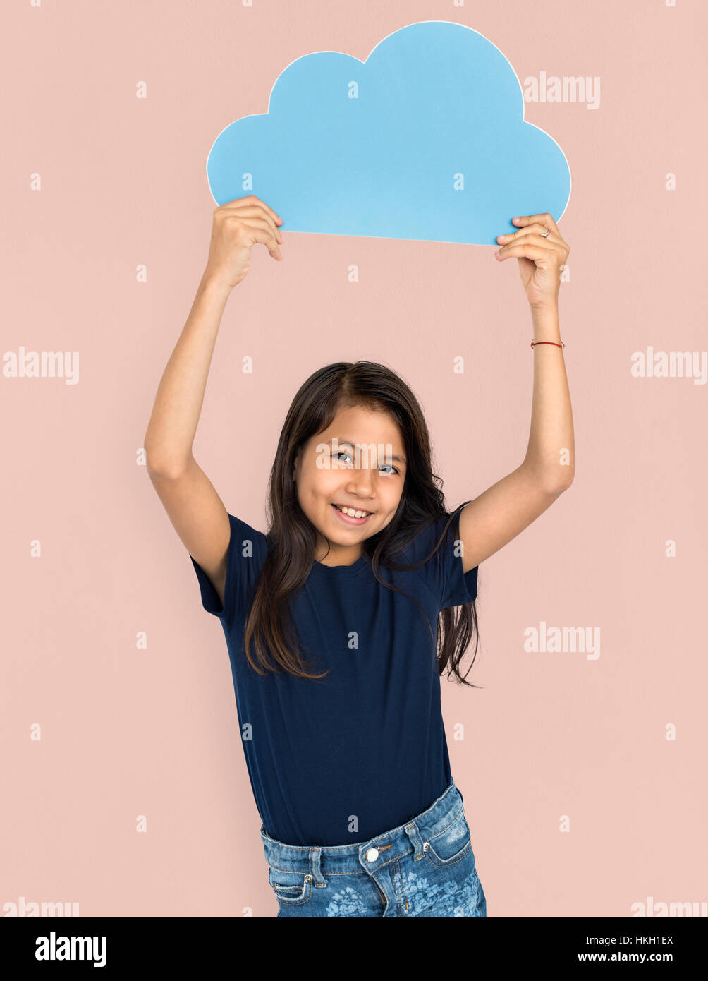 Cheerful Little Girl Holding Cloud Concept Stock Photo - Alamy