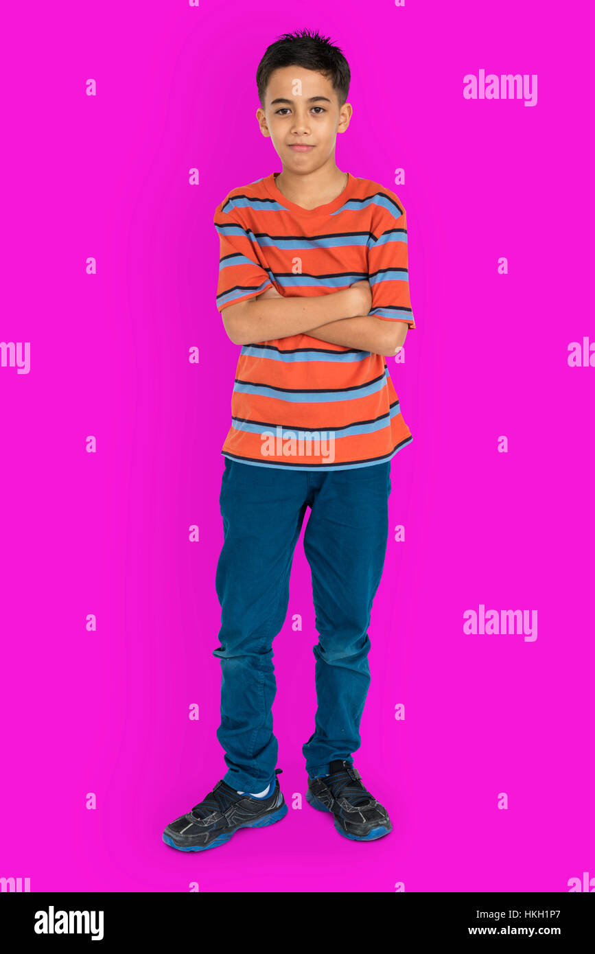 Kid Pose Standing Studio Concept Stock Photo - Alamy