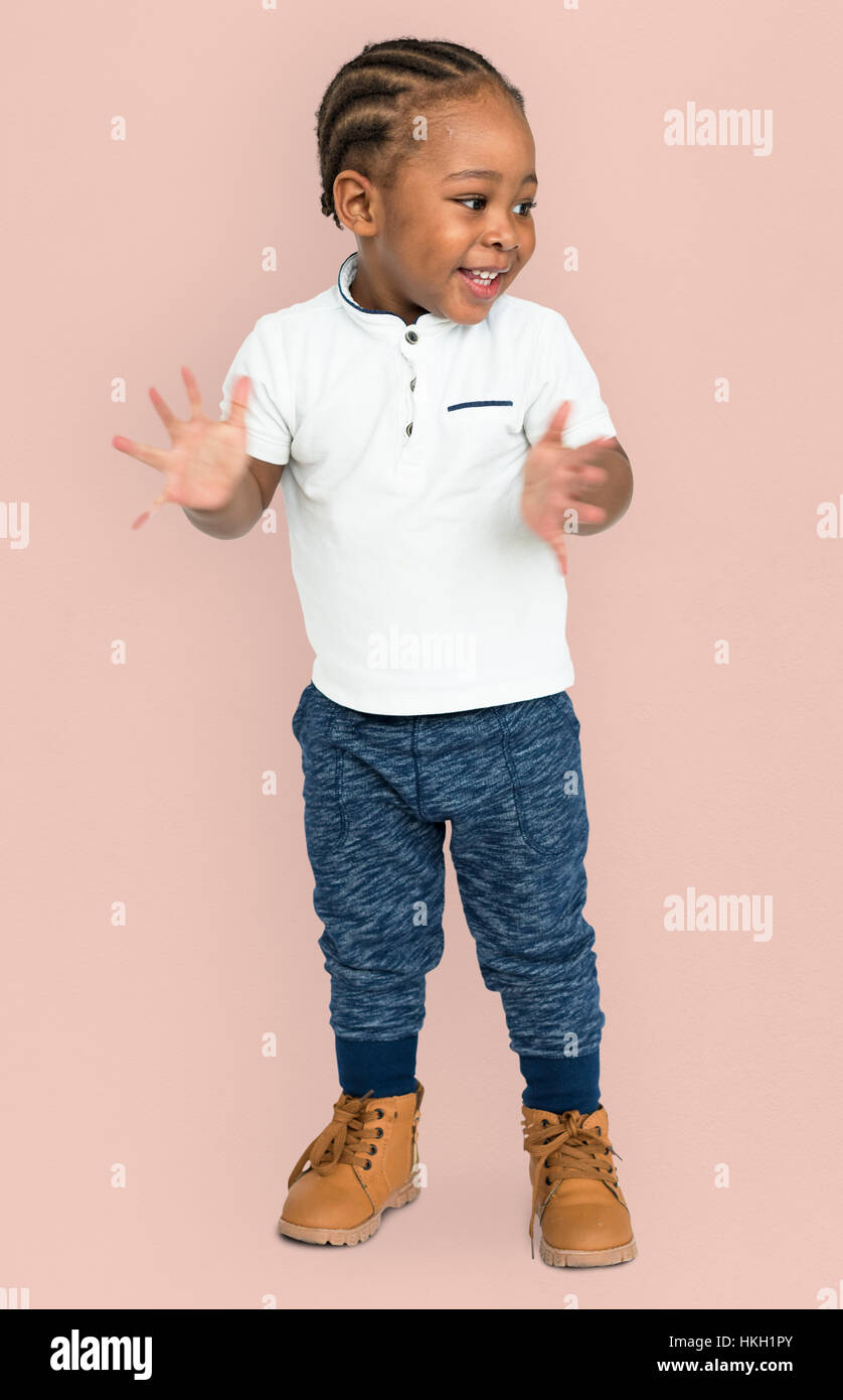 Kid Pose Standing Studio Concept Stock Photo - Alamy