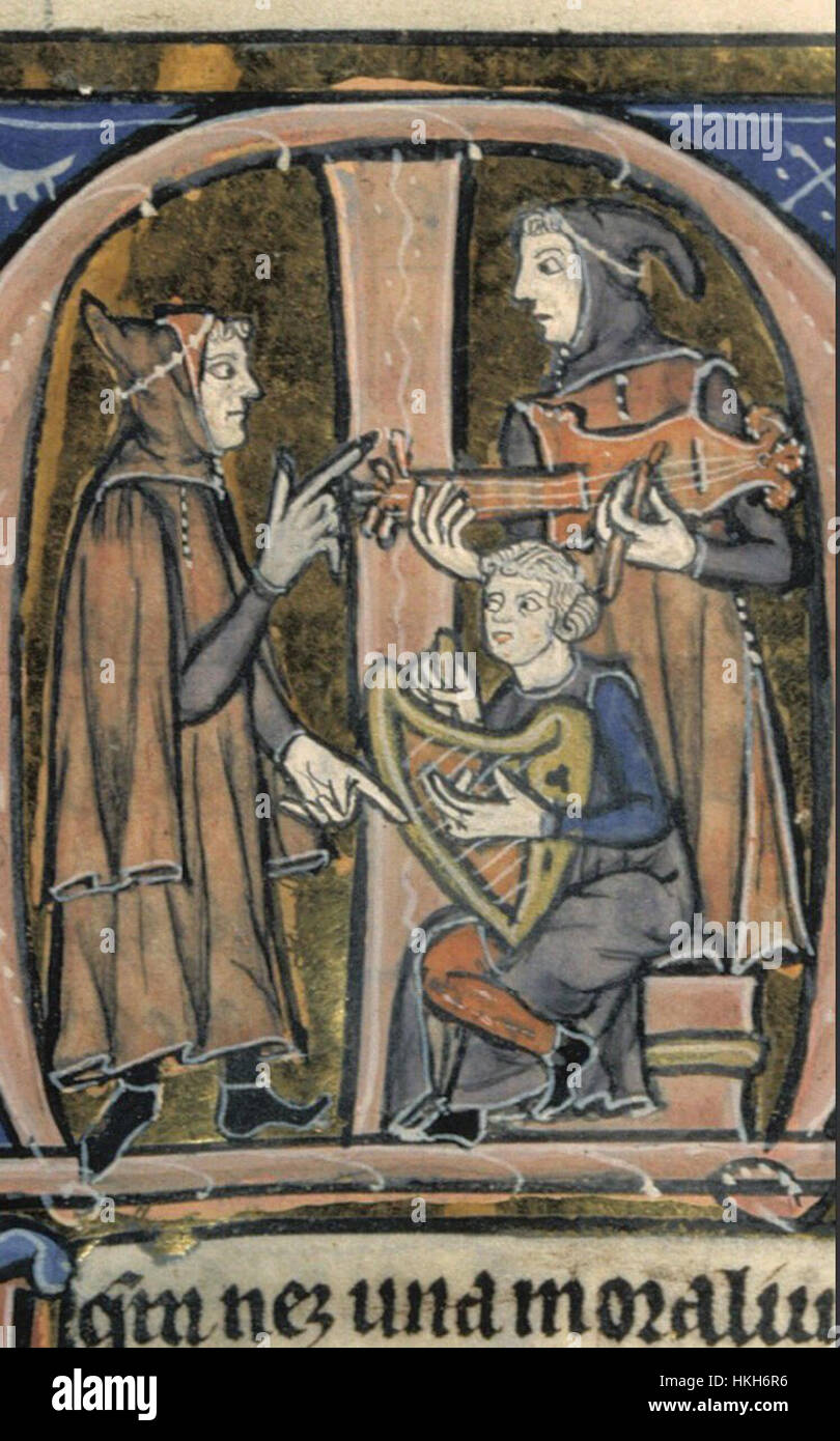 This image showcases a citole and harp, instruments depicted in a ...