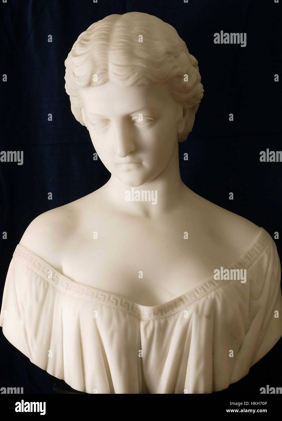 This sculptured bust, created in 1879, showcases a classical beauty ...