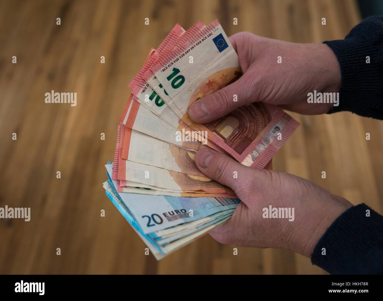 Counting money bank hi-res stock photography and images - Alamy
