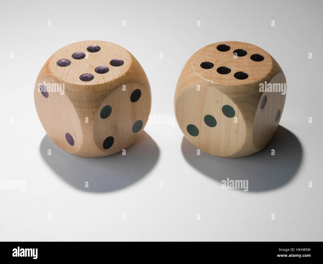 Pair of wooden dice on white background with double six Stock Photo - Alamy