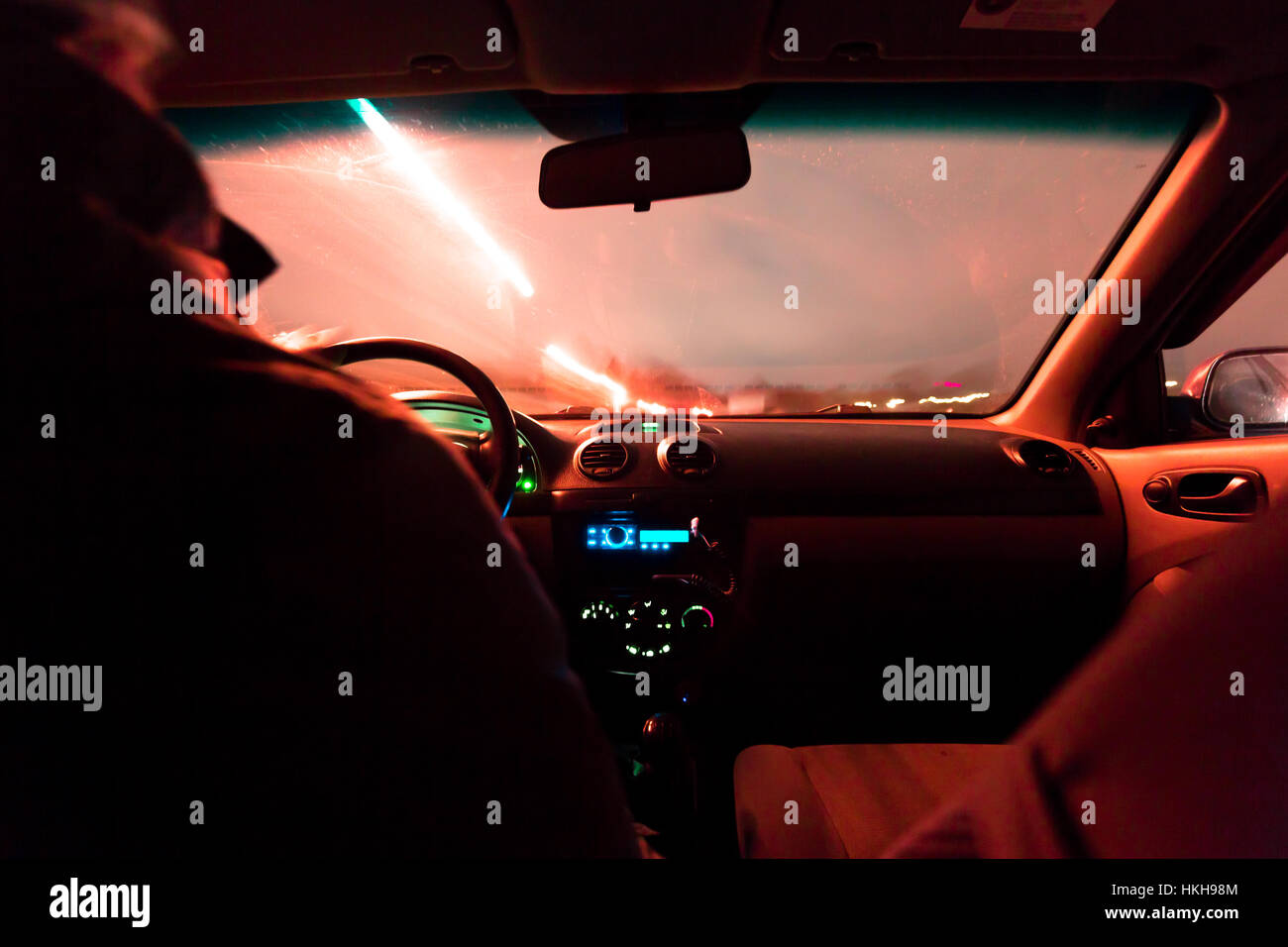 Riding on cars on the road at night Stock Photo - Alamy