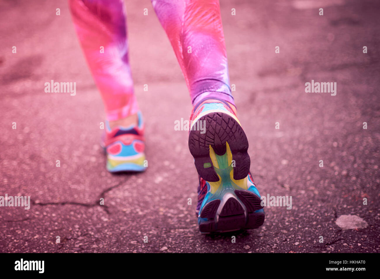 Runner feet running on road closeup on shoes. Woman fitness sunrise jog ...