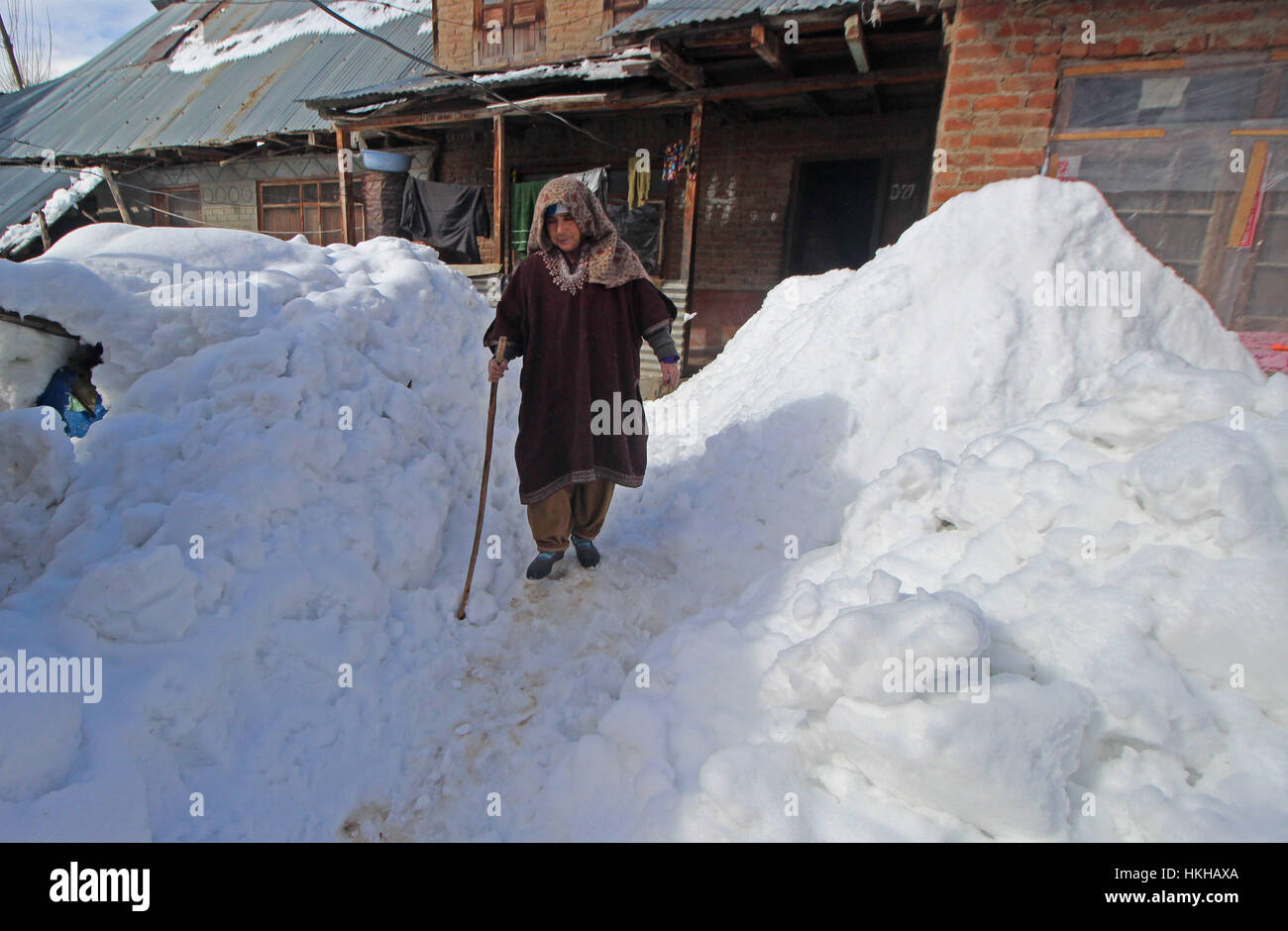 Srinagar, India. 27th Jan, 2017. Elderly Kashmiri woman walks in ...